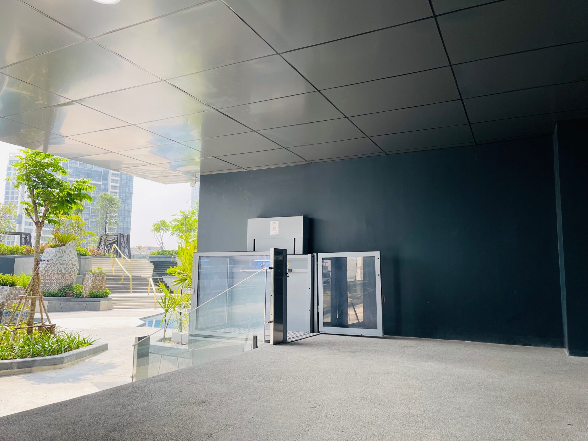 The Vimec S11 Plus platform lift at a hotel in Ho Chi Minh City - Vimec UK