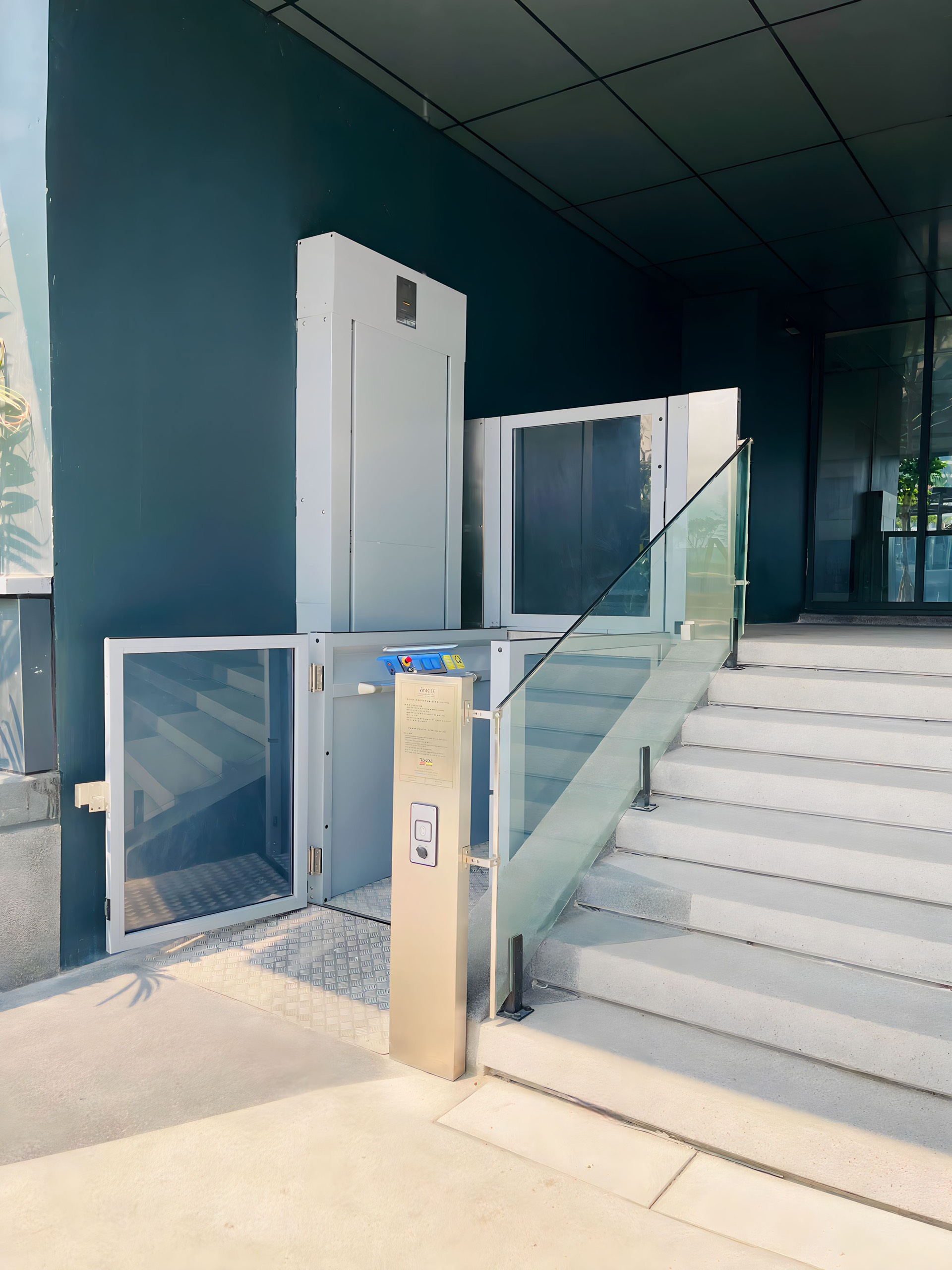 The Vimec S11 Plus platform lift at a hotel in Ho Chi Minh City - Vimec UK