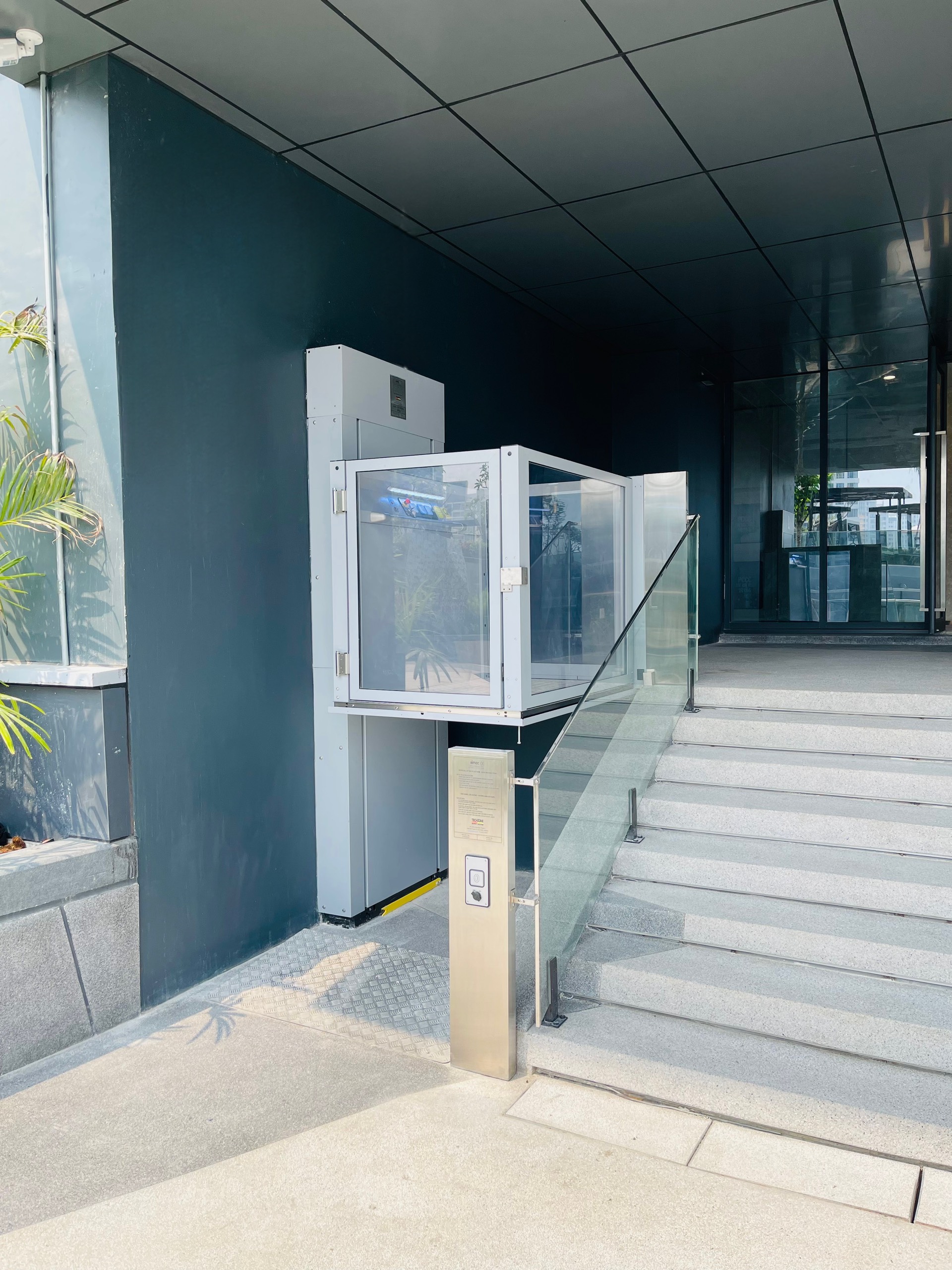 The Vimec S11 Plus platform lift at a hotel in Ho Chi Minh City - Vimec UK